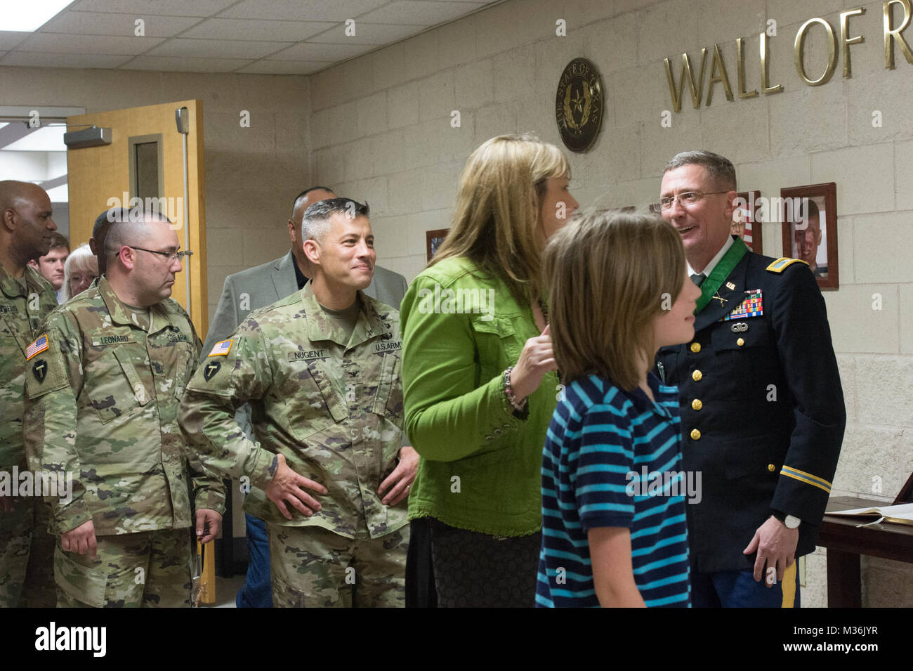 Friends, family and colleagues congratulate Col. Joachim Strenk at his ...
