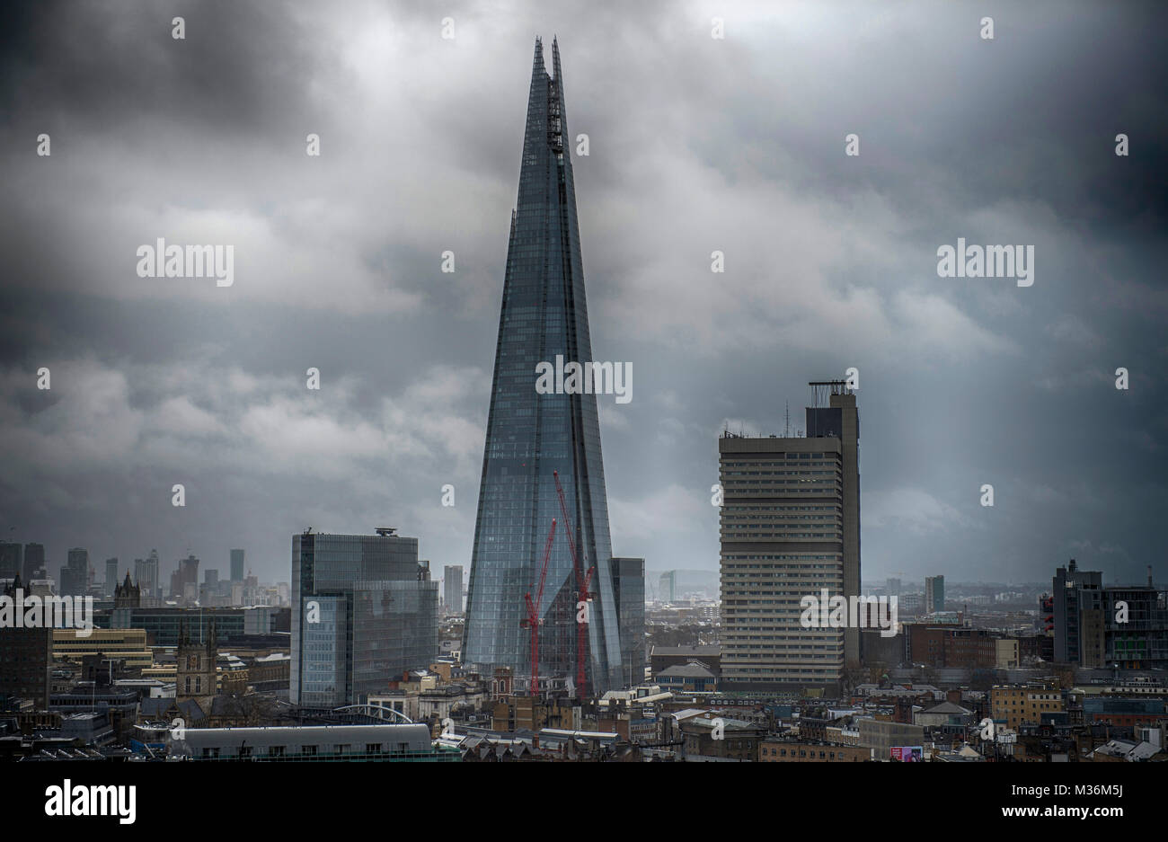 Dramatic London skyline on a grey winter day with skyscraper buildings ...