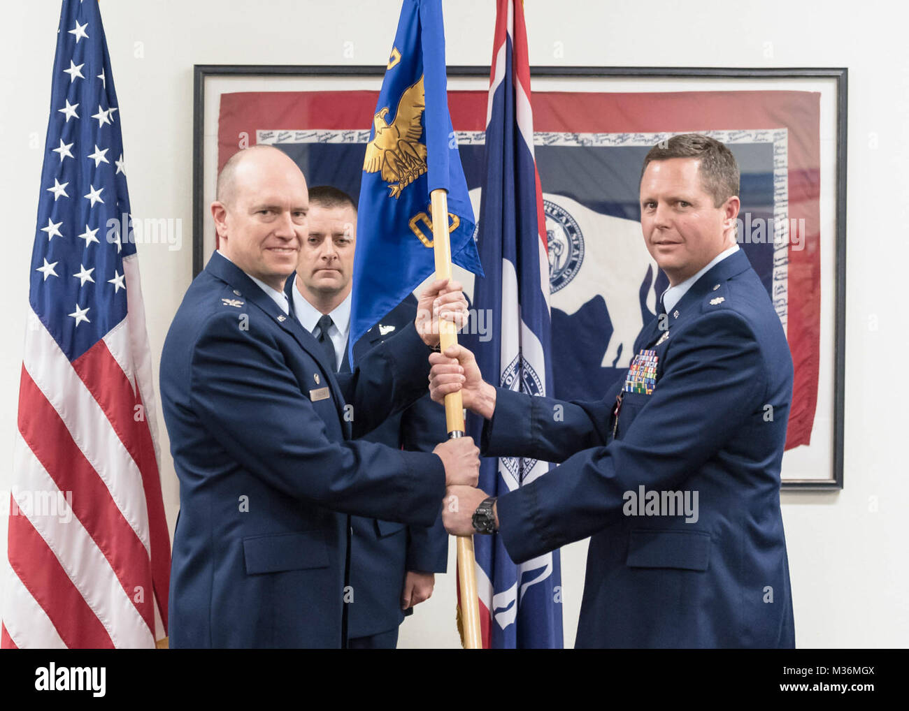 153rd Operations Group Commander Col. Justin Walrath receives the ...