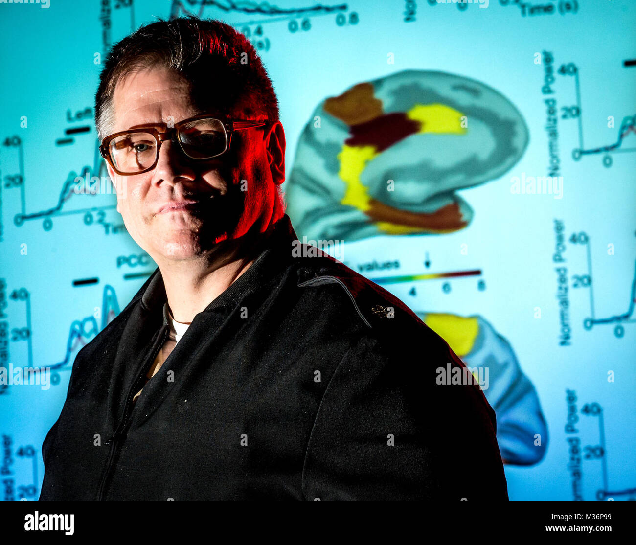 Commander John Hughes, Director of the Magnetoencephalography (MEG ...