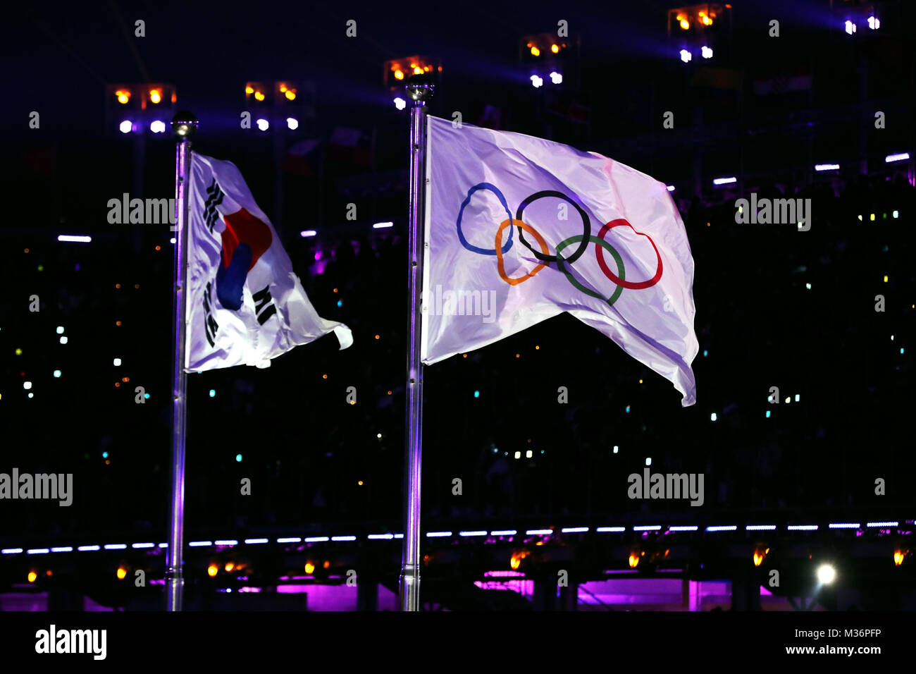 The South Korean and Olympic Flag during the Opening Ceremony of the ...