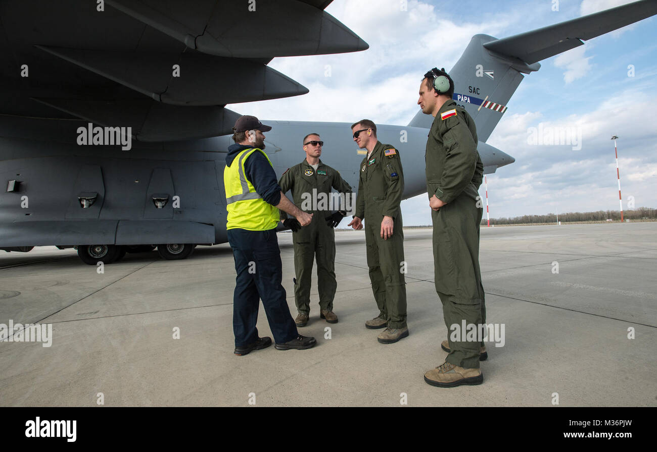 Aircrew do pre-flight checks before takeoff from Pápa Air Base, Hungary ...