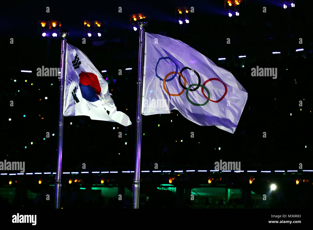 The South Korean and Olympic Flag during the Opening Ceremony of the ...