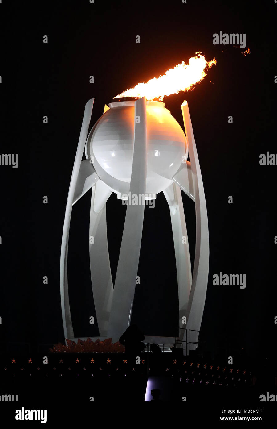 The Olympic torch is lit during the Opening Ceremony of the PyeongChang ...