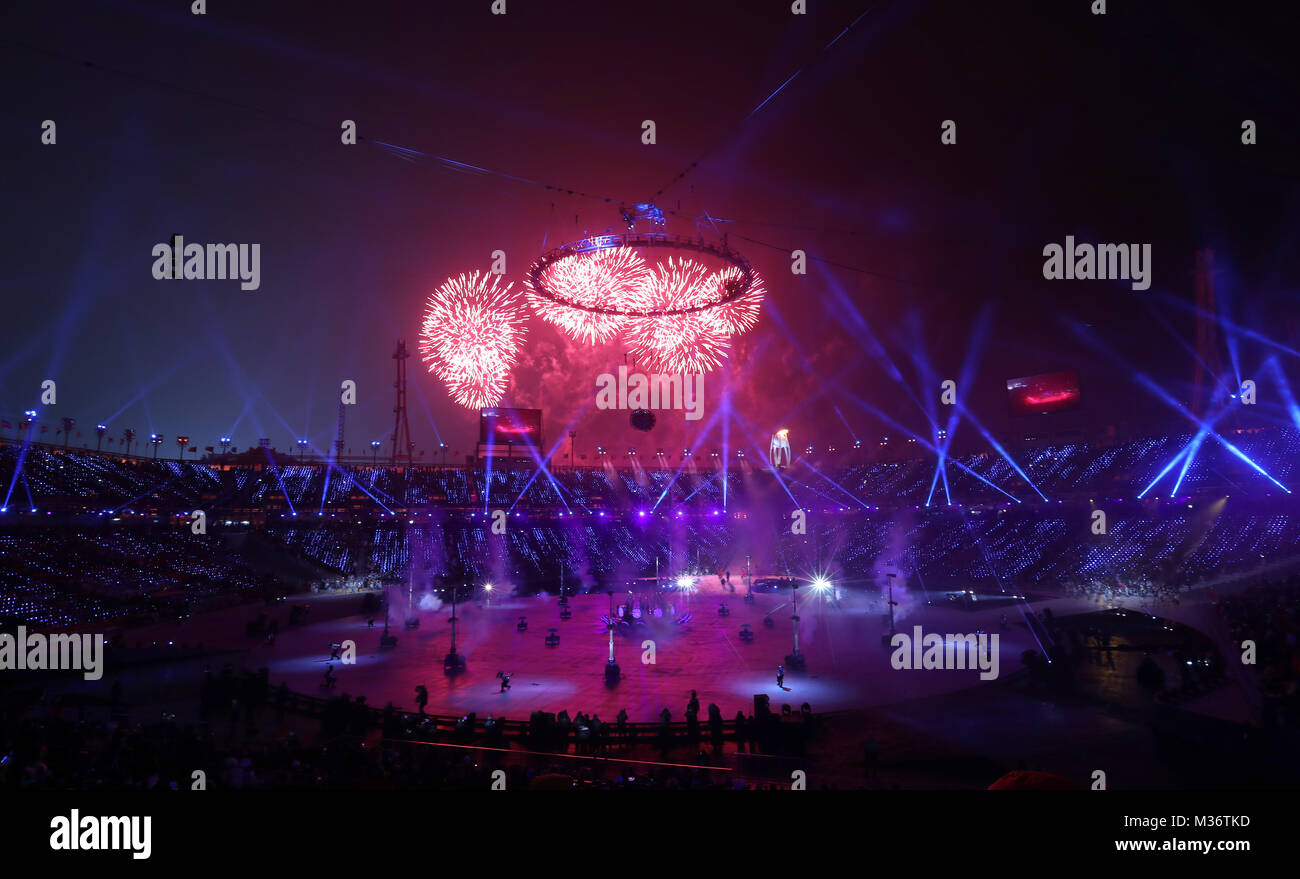 Fireworks are set off as the Olympic torch is lit during the Opening ...