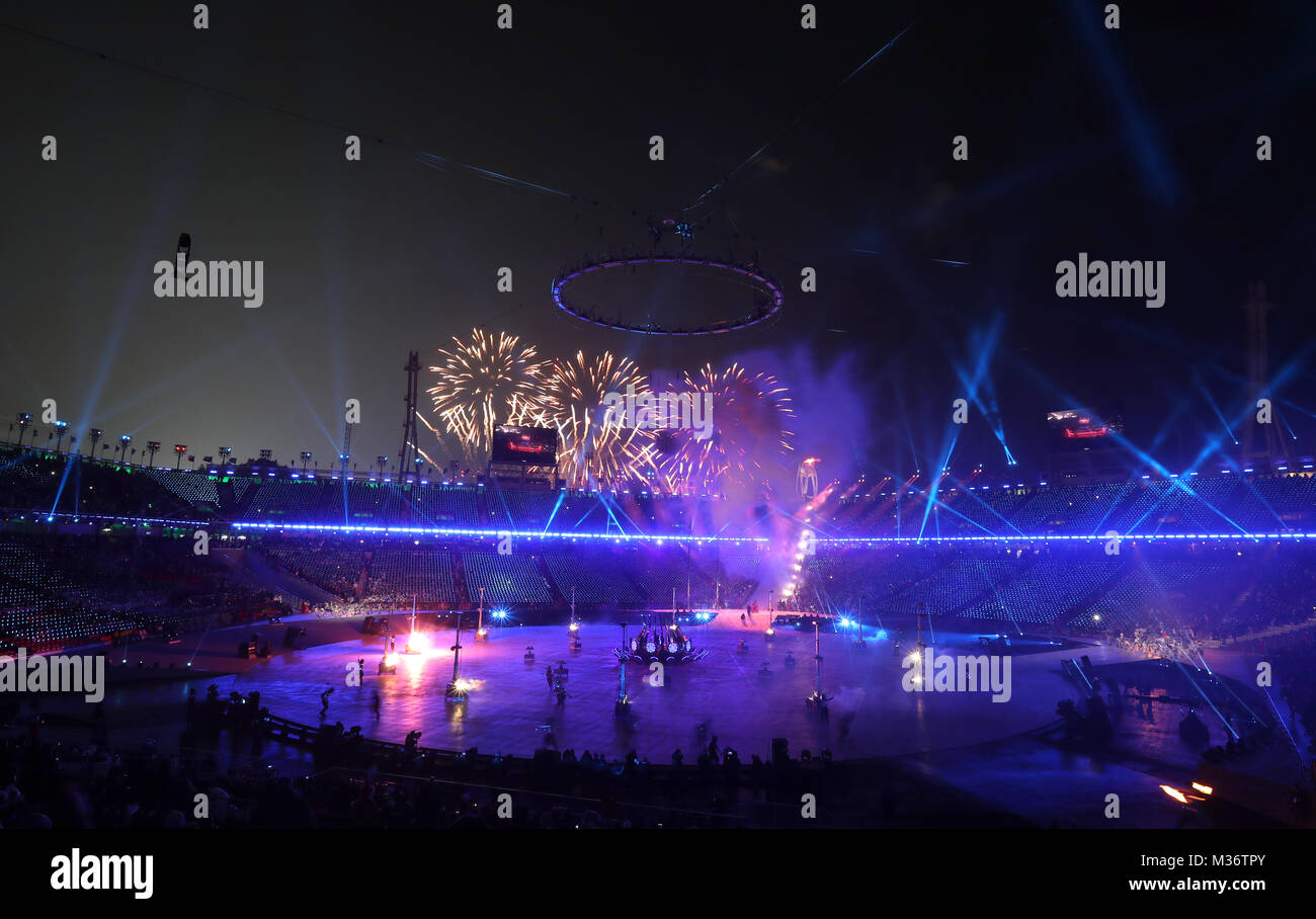 Fireworks are set off as the Olympic torch is lit during the Opening ...