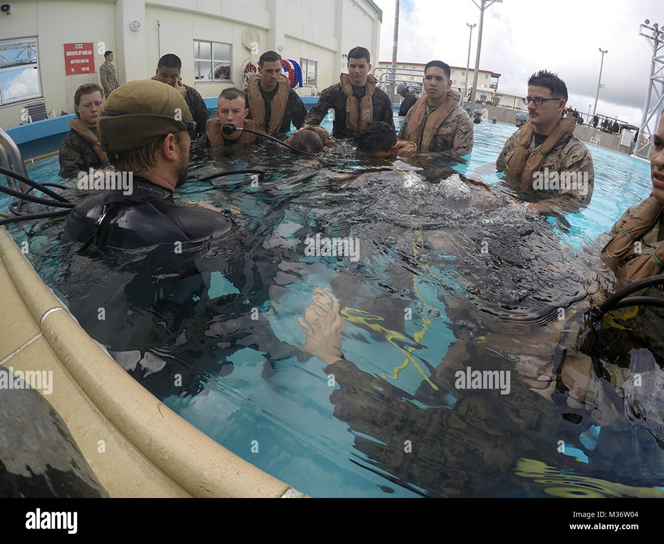 An underwater egress training instructor prepares Marines from the 31st ...