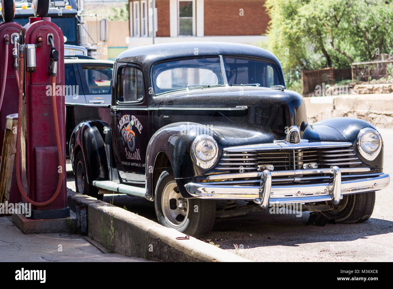 classic old American pick-up truck on an old small-town street in ...