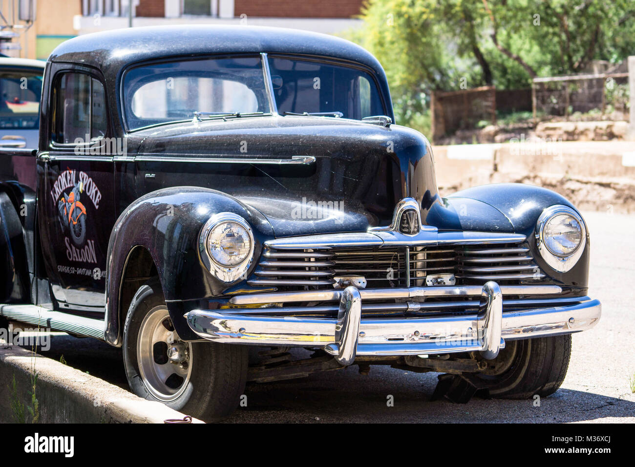 classic old American pick-up truck on an old small-town street in ...