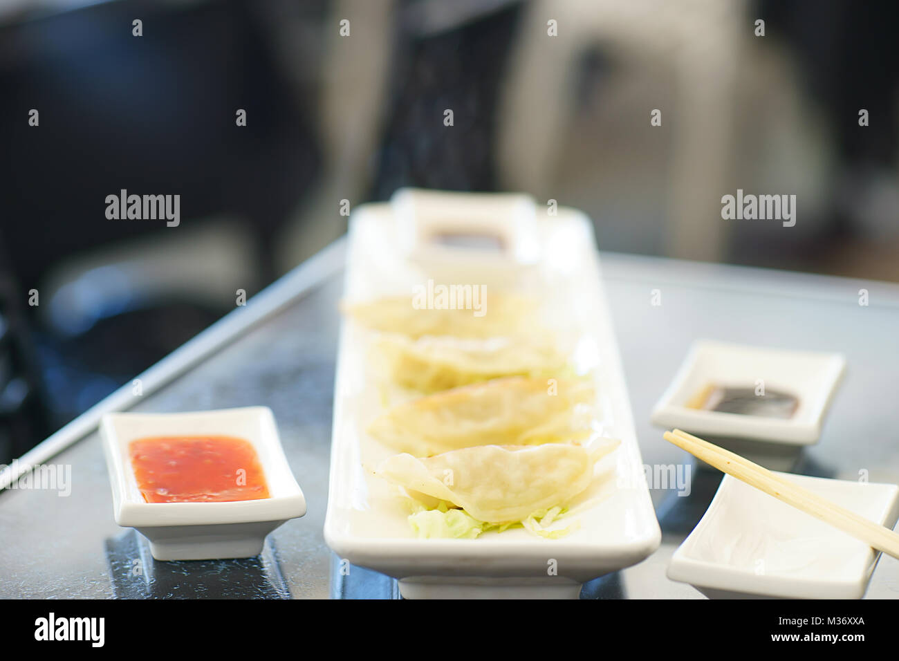 Steamed ravioli - Asian restaurant in Naples, Italy Stock Photo - Alamy