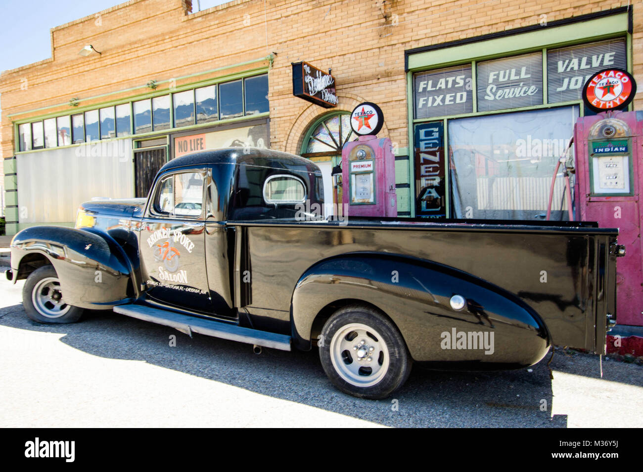 classic old American pick-up truck on an old small-town street in ...