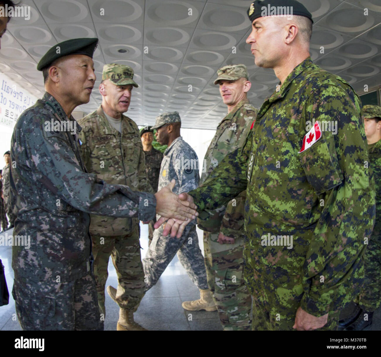 ROK general greets Canadian and U.S. generals during a training mission ...