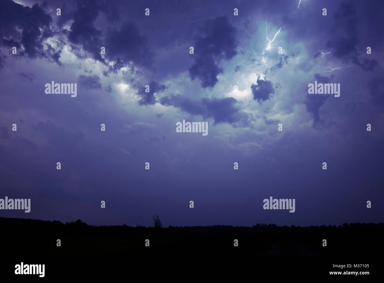 Lightning in a stormy night Stock Photo - Alamy