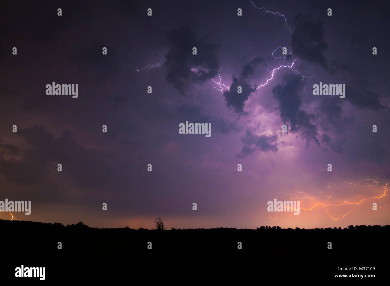 Lightning in a stormy night Stock Photo - Alamy