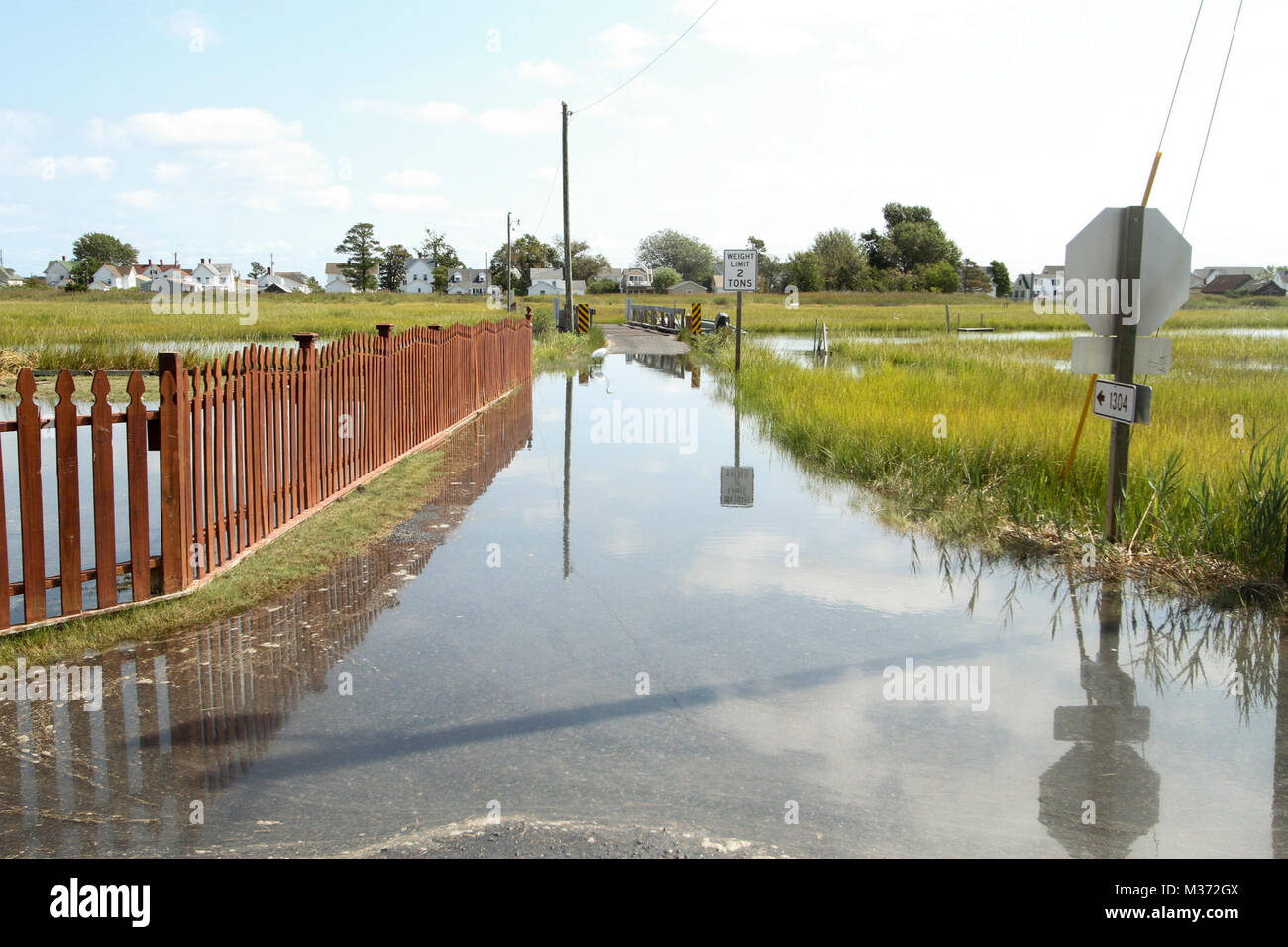 TANGIER, Va. – Tidal flood waters cover roads around the small ...