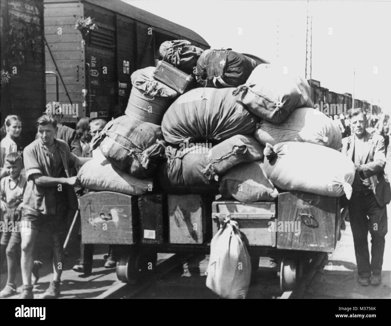 A refugee train with Sudeten Germans has arrived at the transit camp in ...