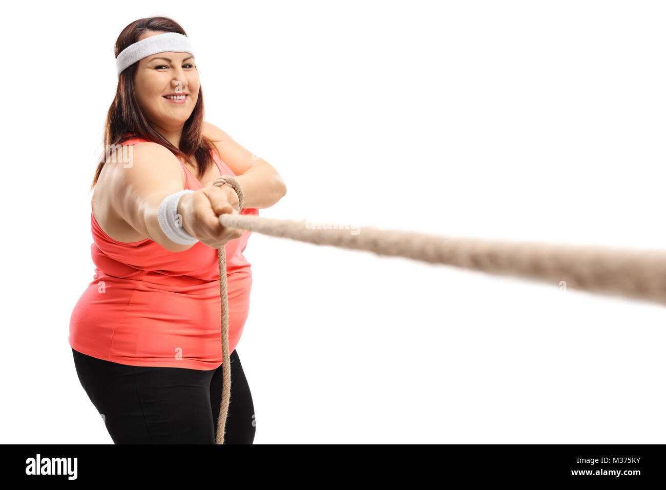 Overweight woman pulling a rope isolated on white background Stock ...