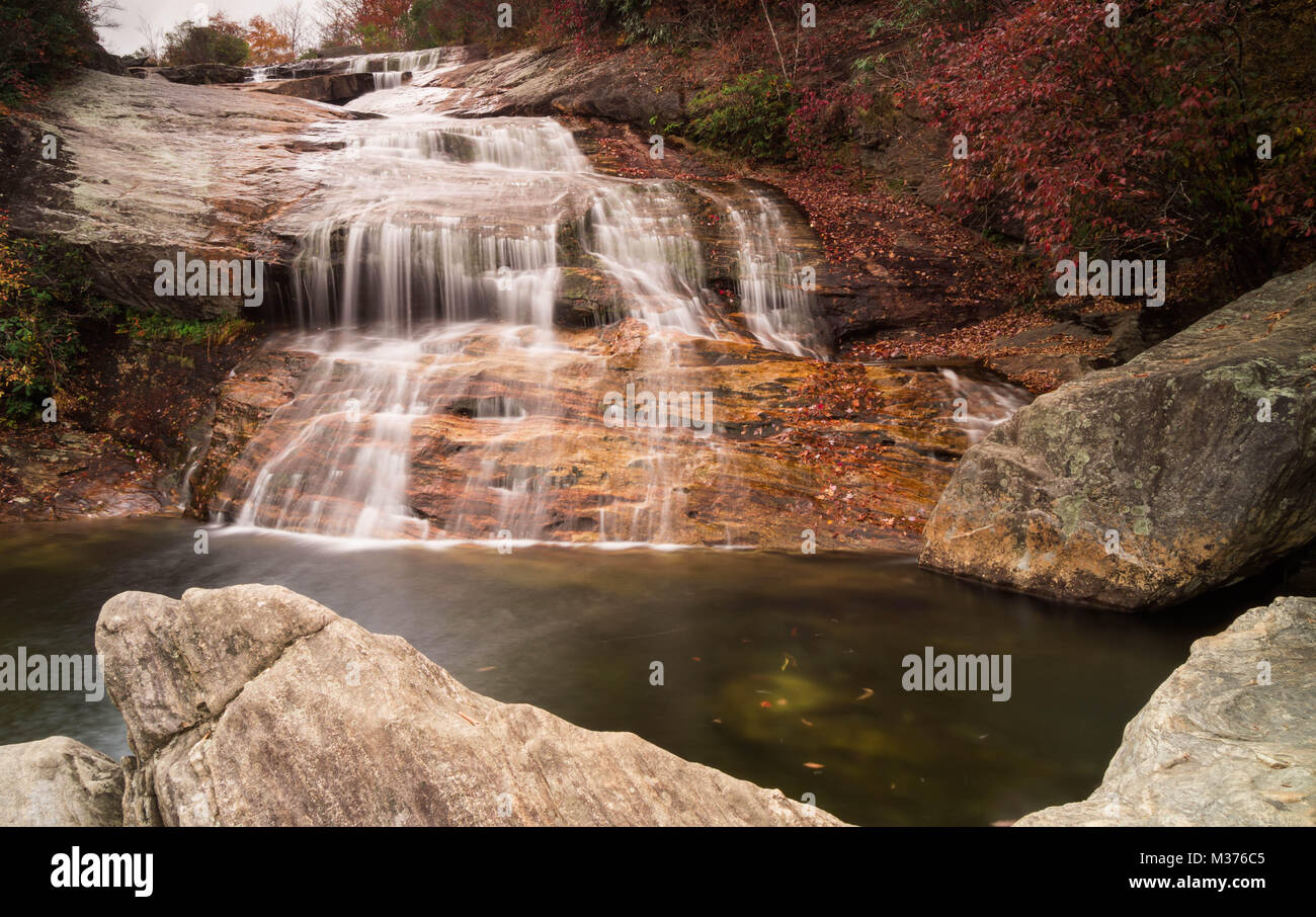 beautiful mountain stream and waterfall with swimming hole and fall ...