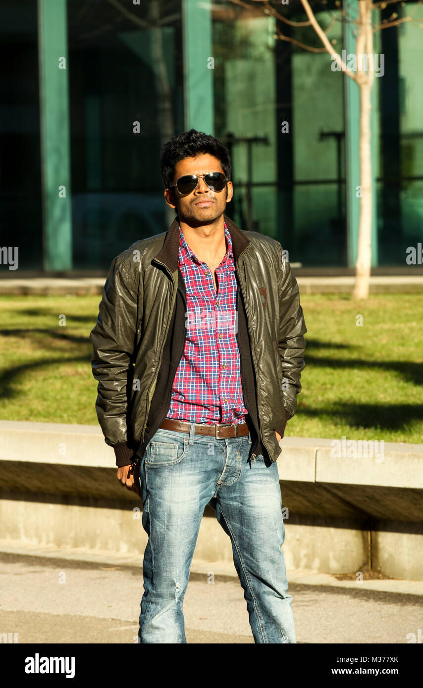portrait of cool young man with sunglasses, outdoors Stock Photo - Alamy