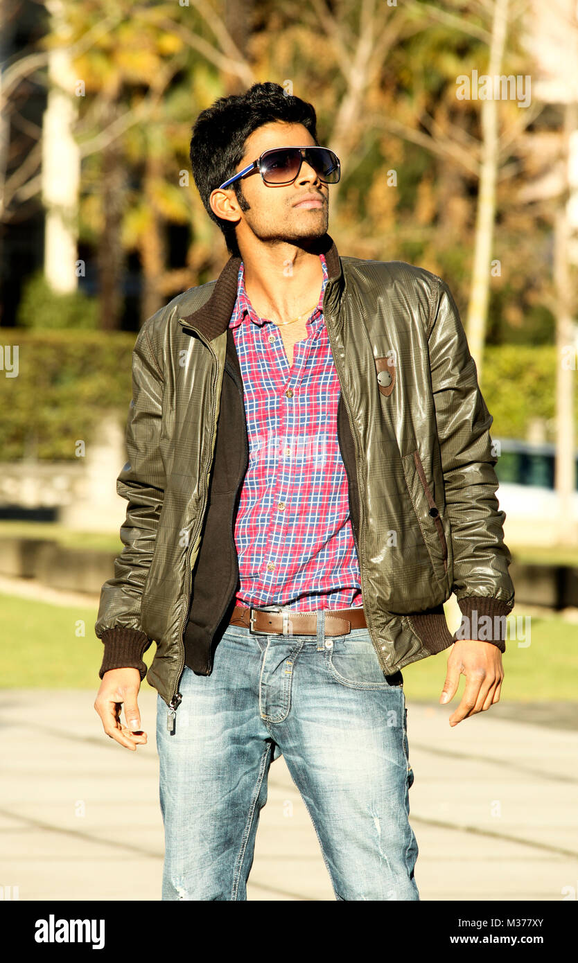 portrait of cool young man with sunglasses, outdoors Stock Photo - Alamy