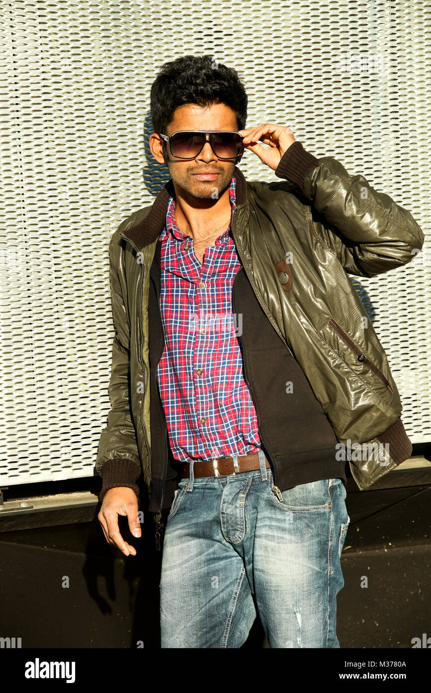 portrait of cool young man with sunglasses, outdoors Stock Photo - Alamy