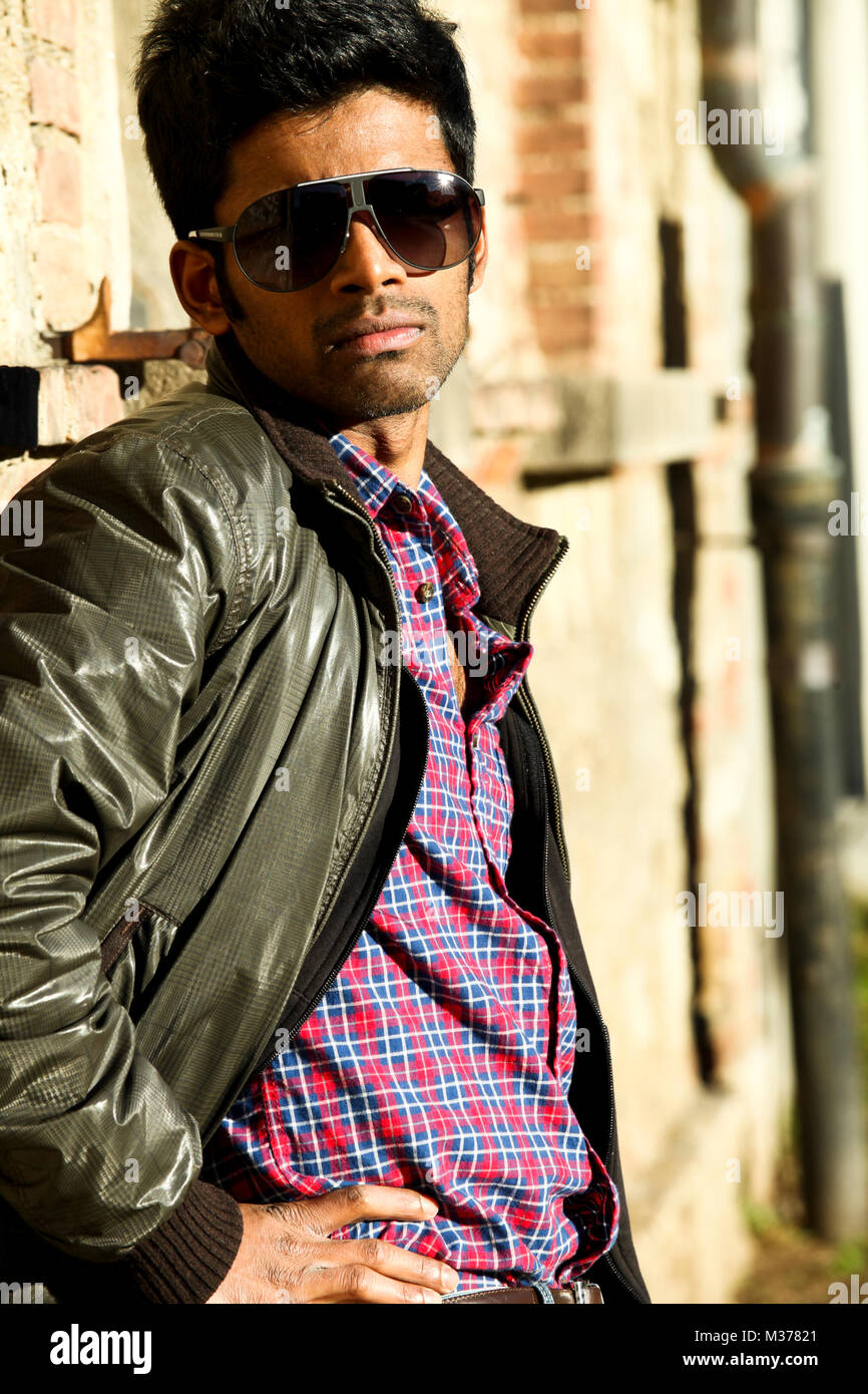 portrait of cool young man with sunglasses, outdoors Stock Photo - Alamy