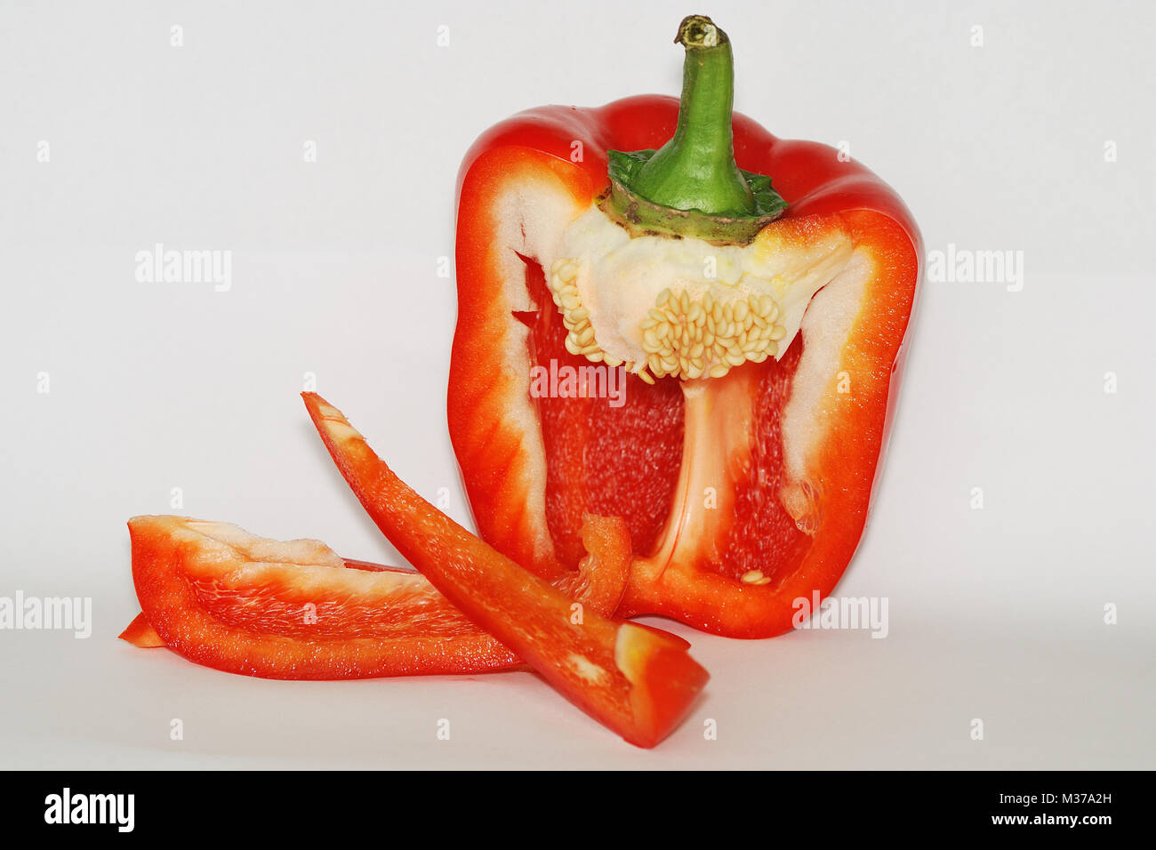 Yellow pepper cut in half hi-res stock photography and images - Alamy