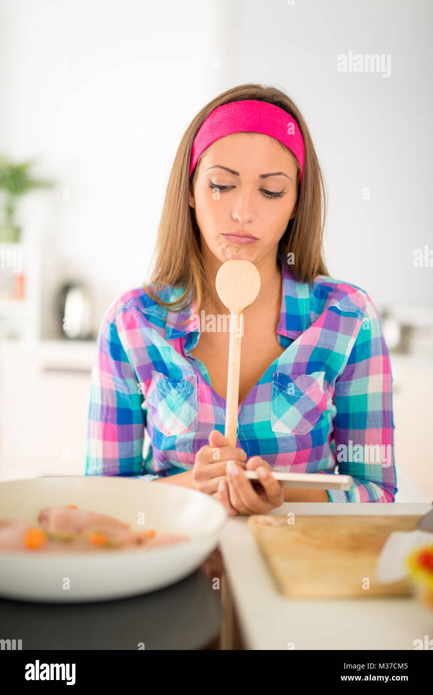 Woman cooking healthy meal in hi-res stock photography and images - Alamy