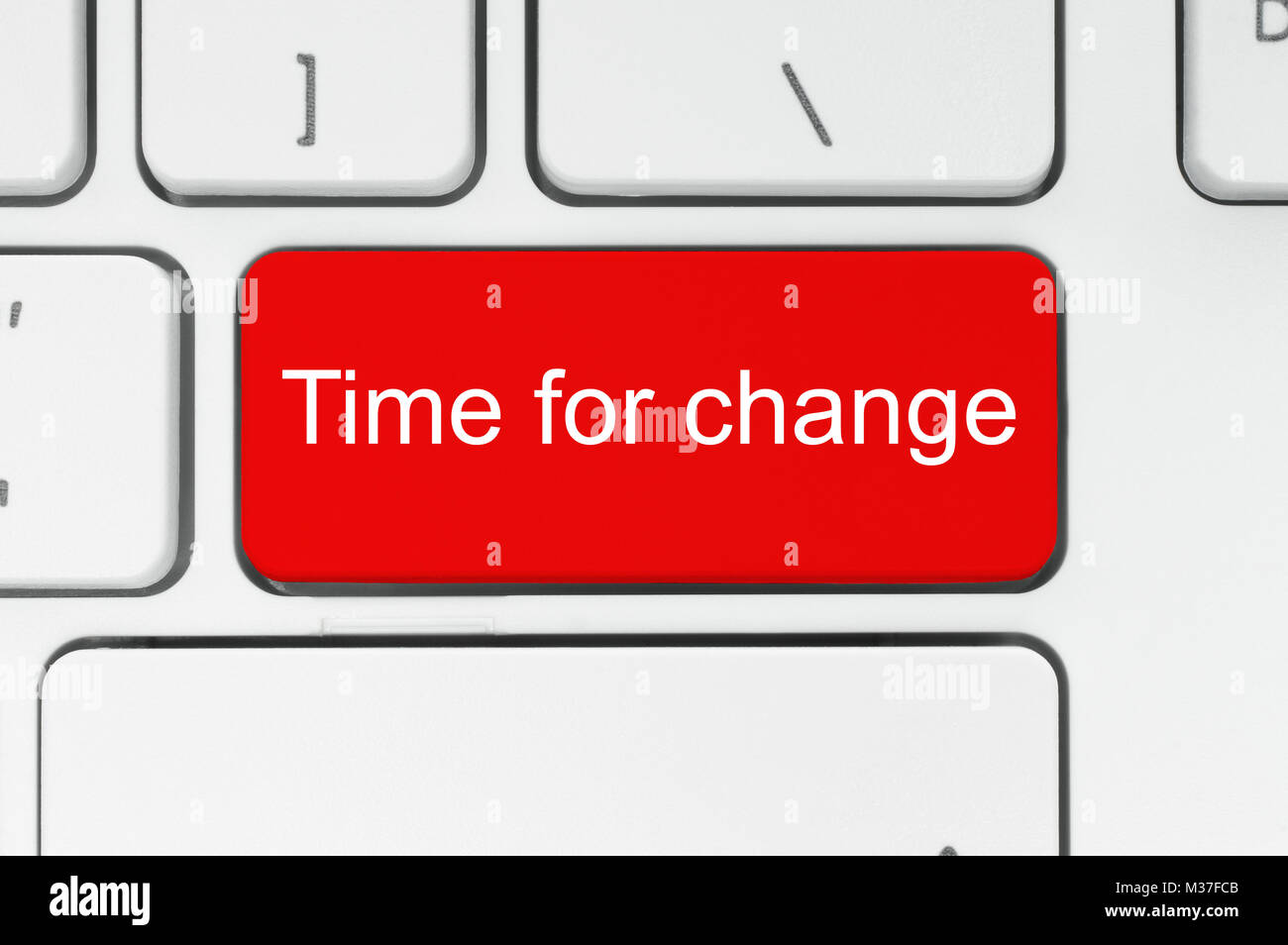Red button with time to change words on the keyboard close-up Stock ...
