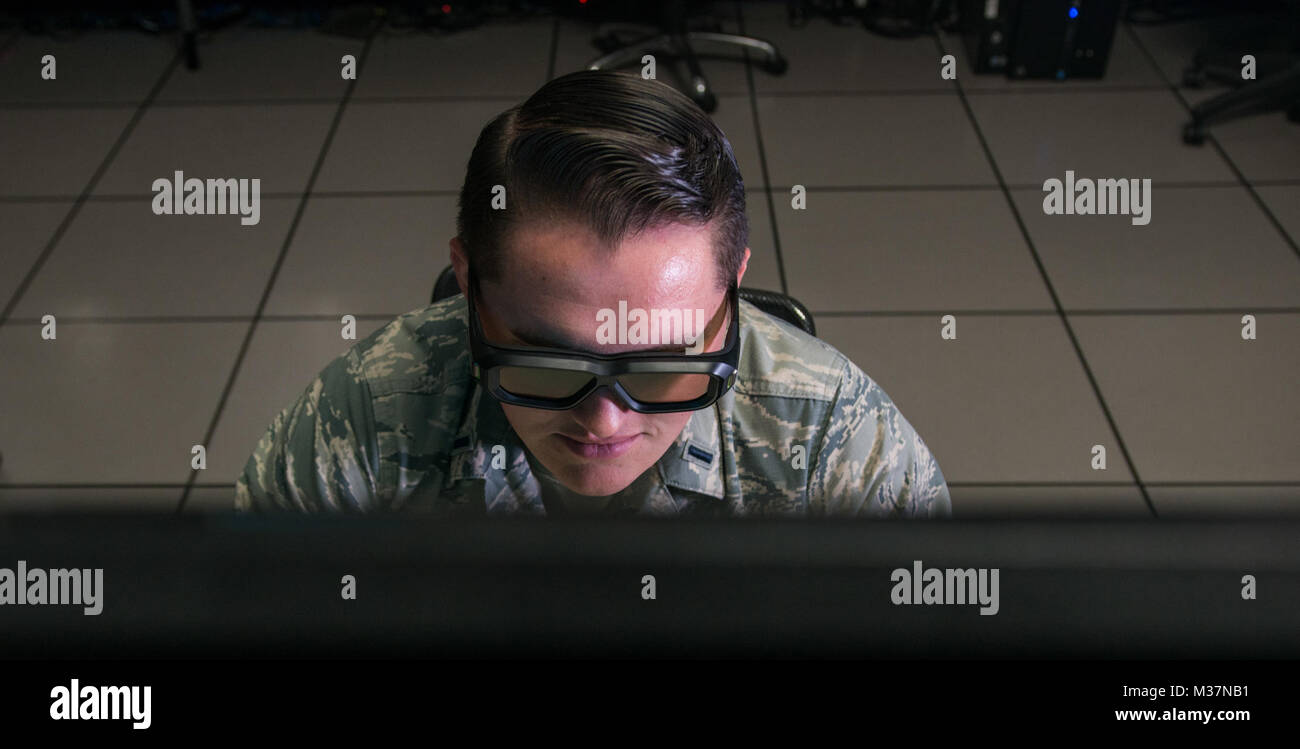 A targeteer with 613th Air Operations Center for Pacific Air Forces ...
