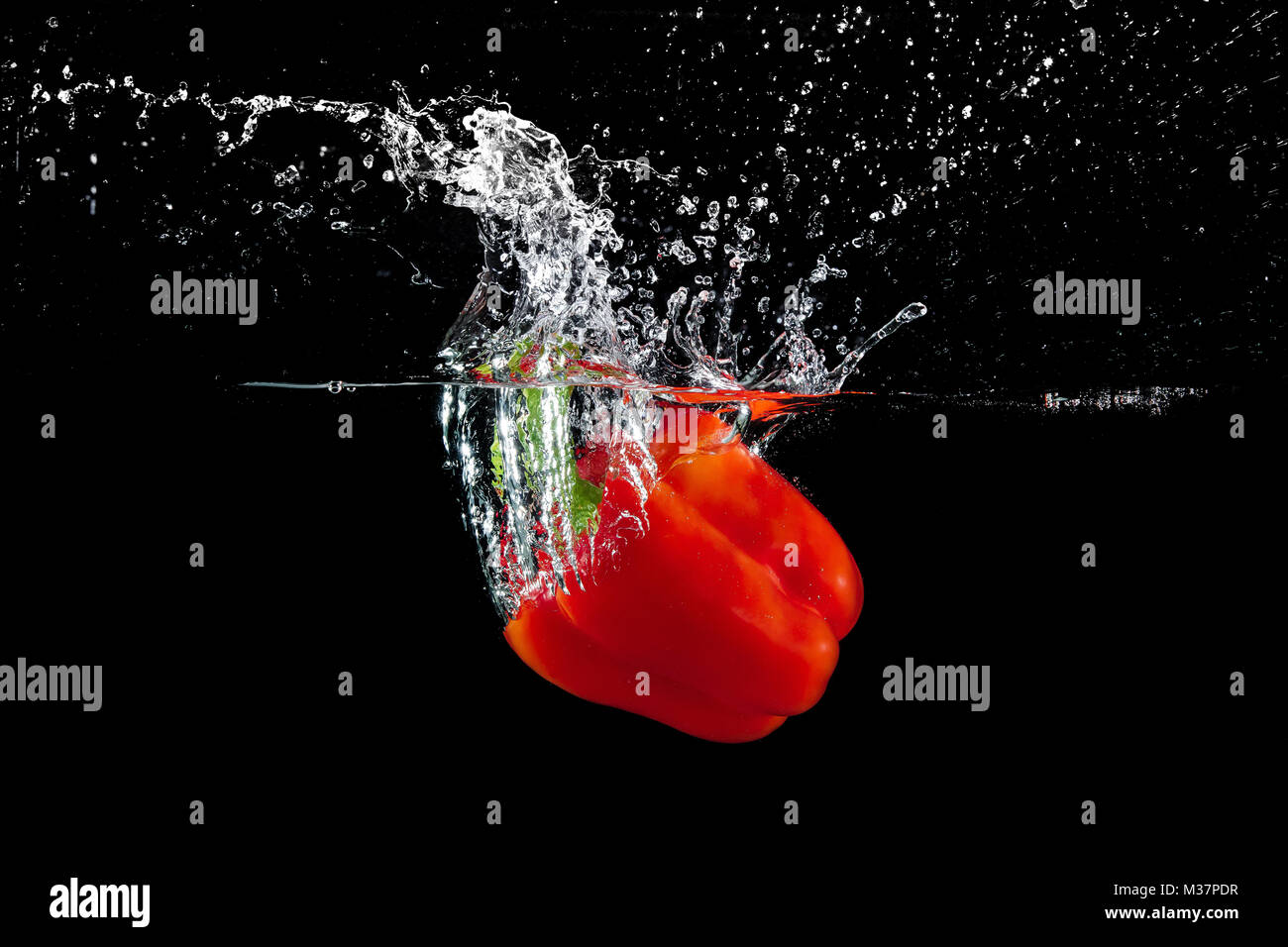 bell pepper in water with splash Stock Photo - Alamy