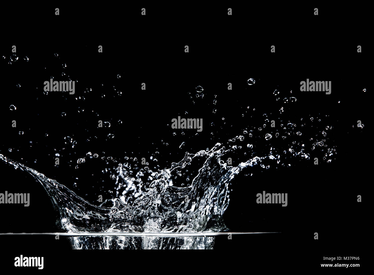 water splash on black Stock Photo - Alamy