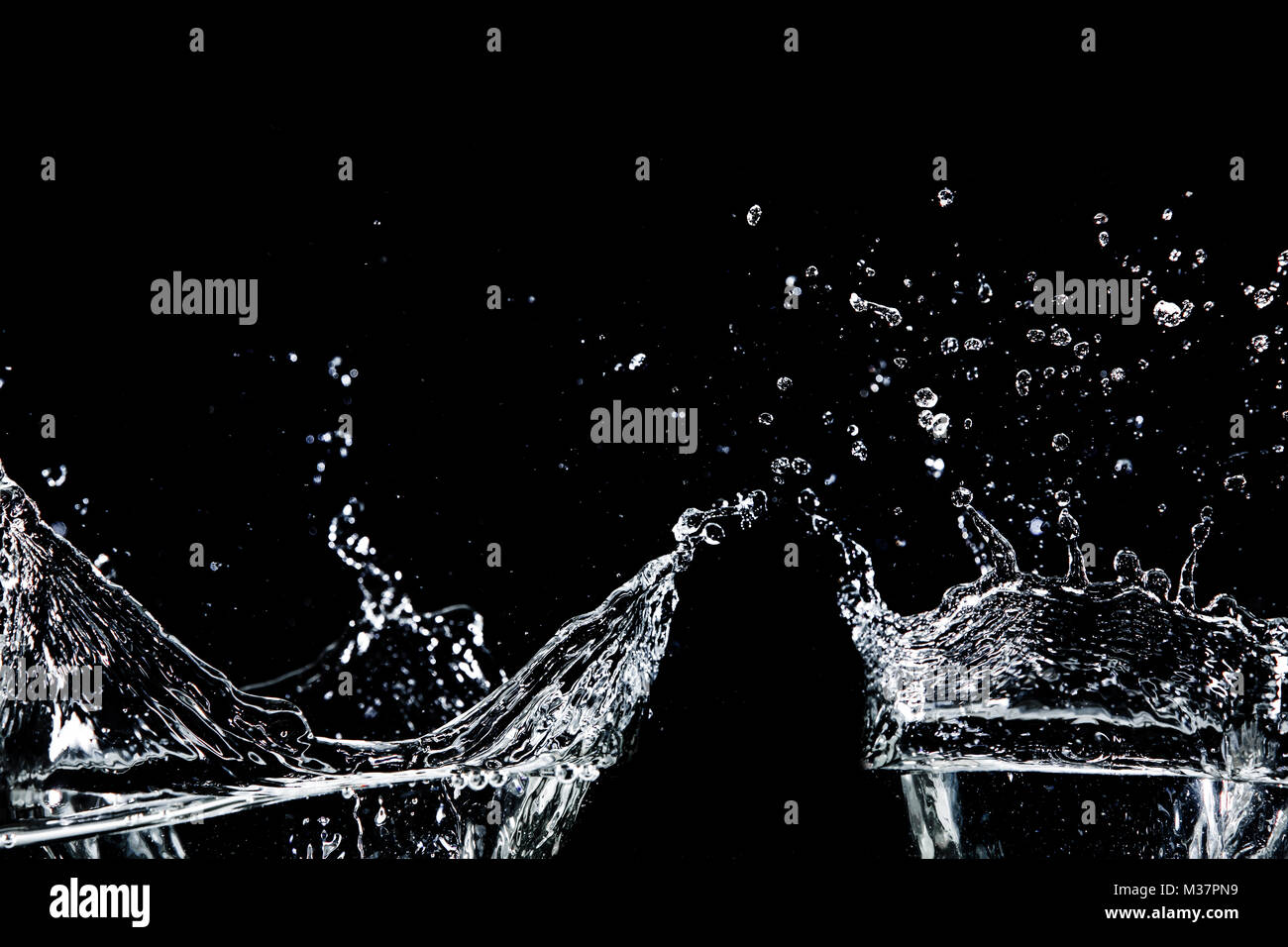 water splash on black Stock Photo - Alamy