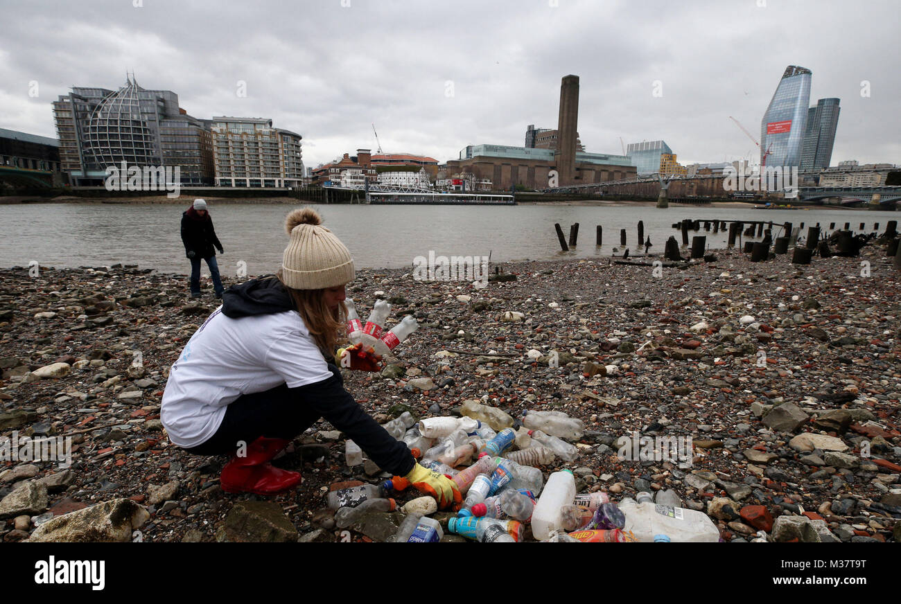 Volunteers collect and count plastic bottles littering the foreshore of ...