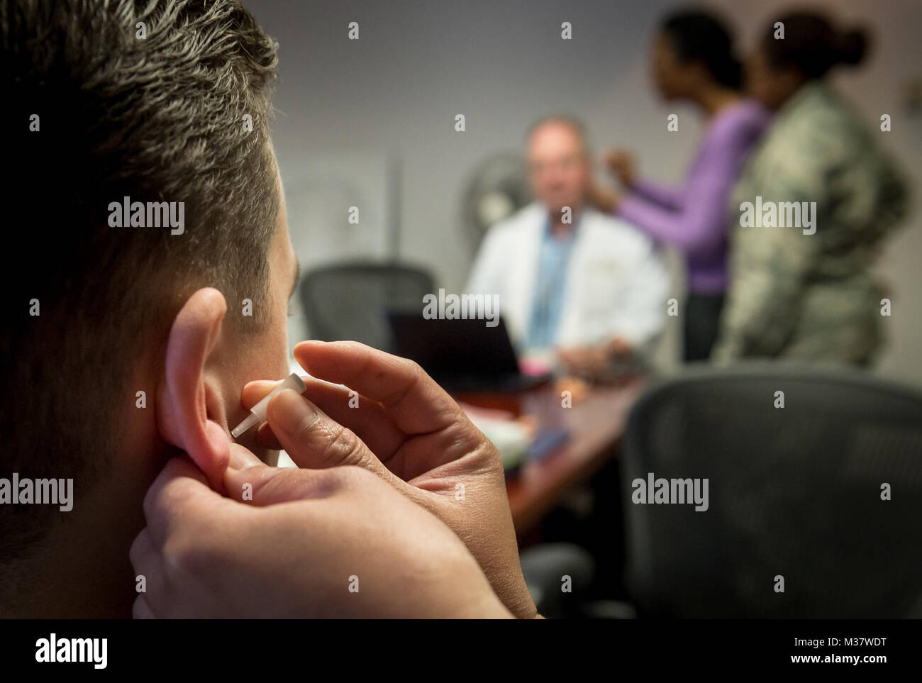 Students practice the application of Battlefield Acupuncture on each ...