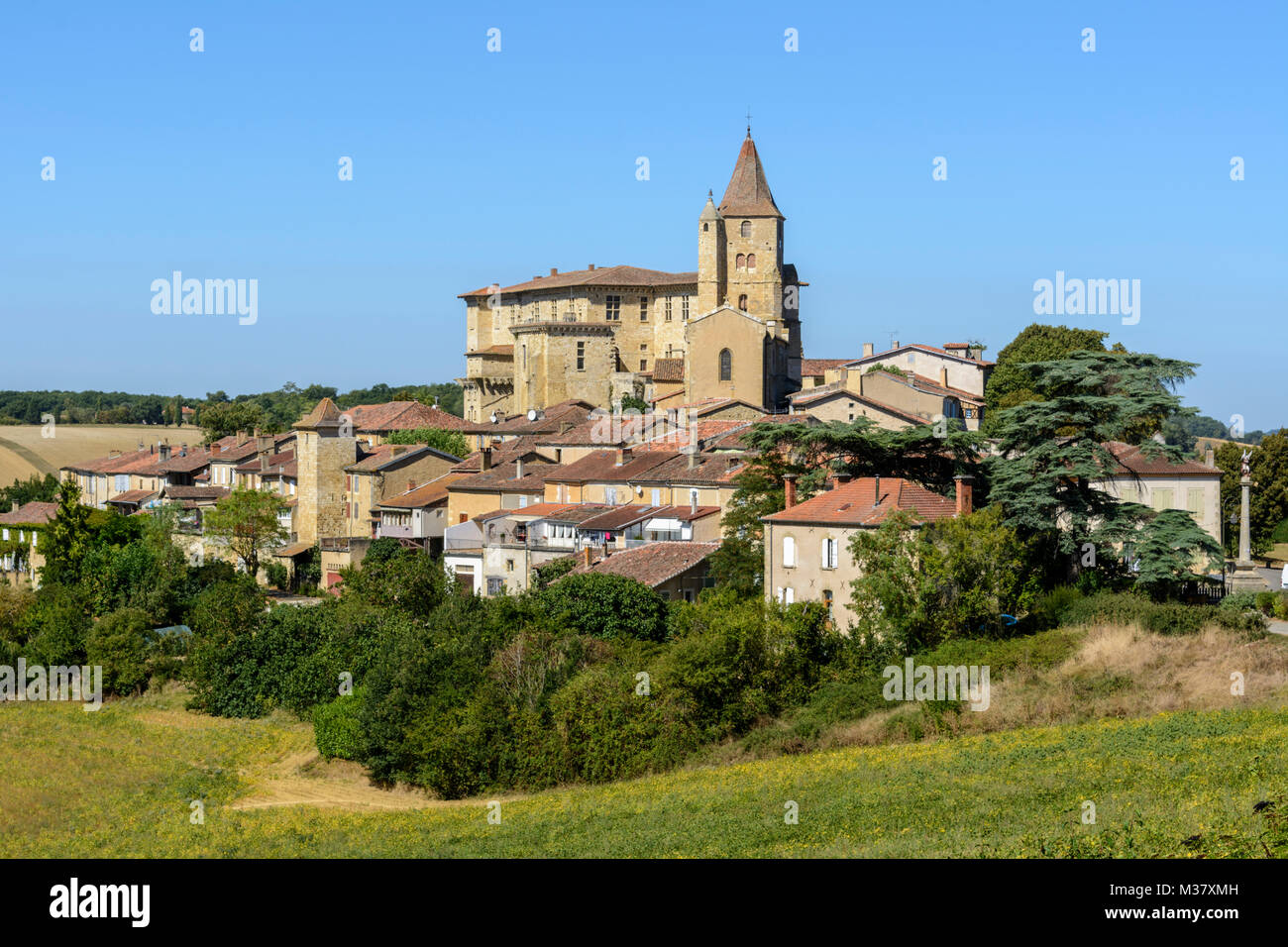 The restored medieval hilltop village of Lavardens, dominated by its ...