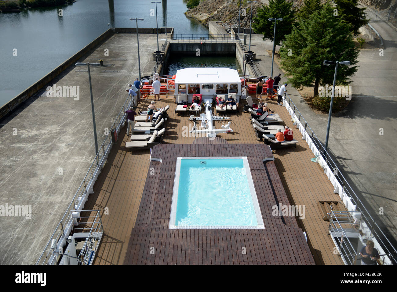 Douro Spirit cruise ship passing through a sluice gate while navigating ...