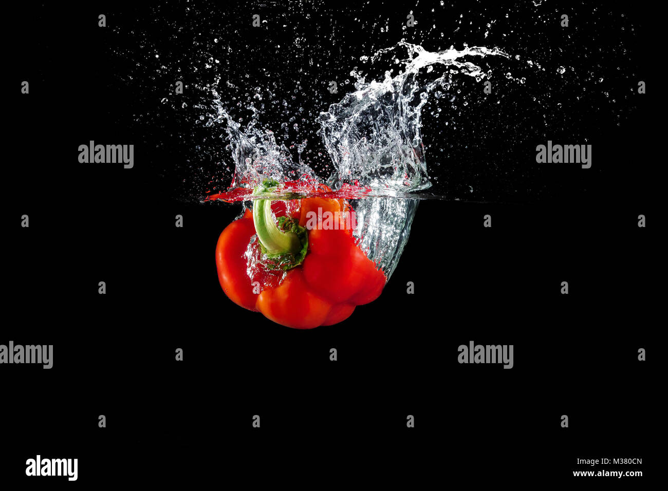 bell pepper in water with splash Stock Photo - Alamy