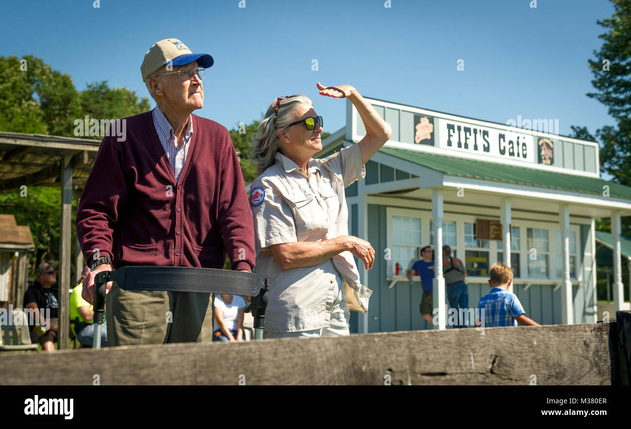 Al Tucker Jr. and his daughter, Sue Tucker Brander, watch Dave Brown ...