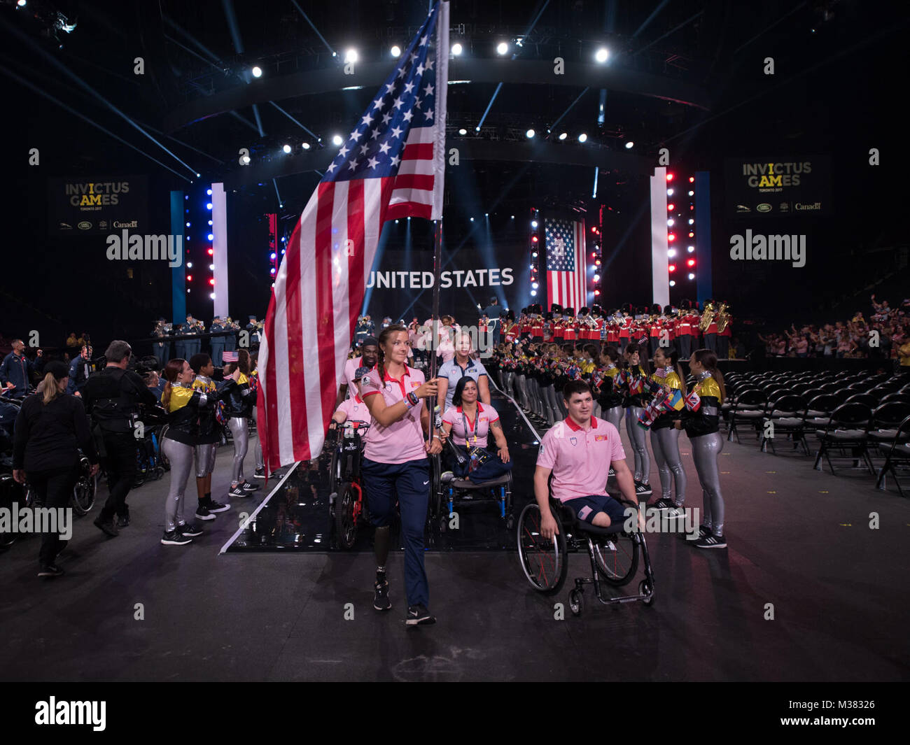 US Team captain Capt. Christy Wise, U.S. Air Force, carries the ...