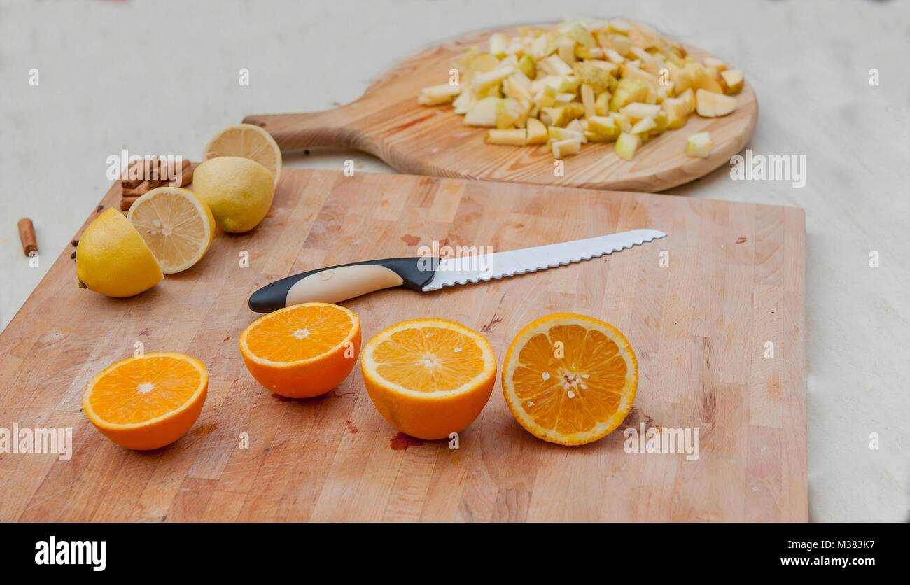 cut orange ready to be squeezed Stock Photo - Alamy