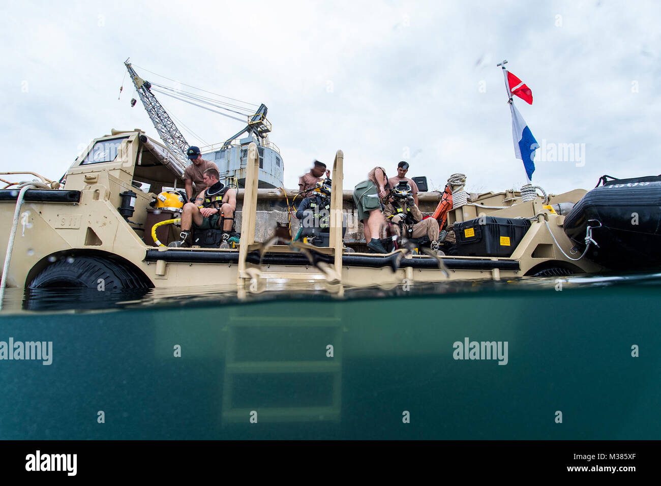 U.S. Navy Seabees, assigned to Underwater Construction Team (UCT) 2 ...