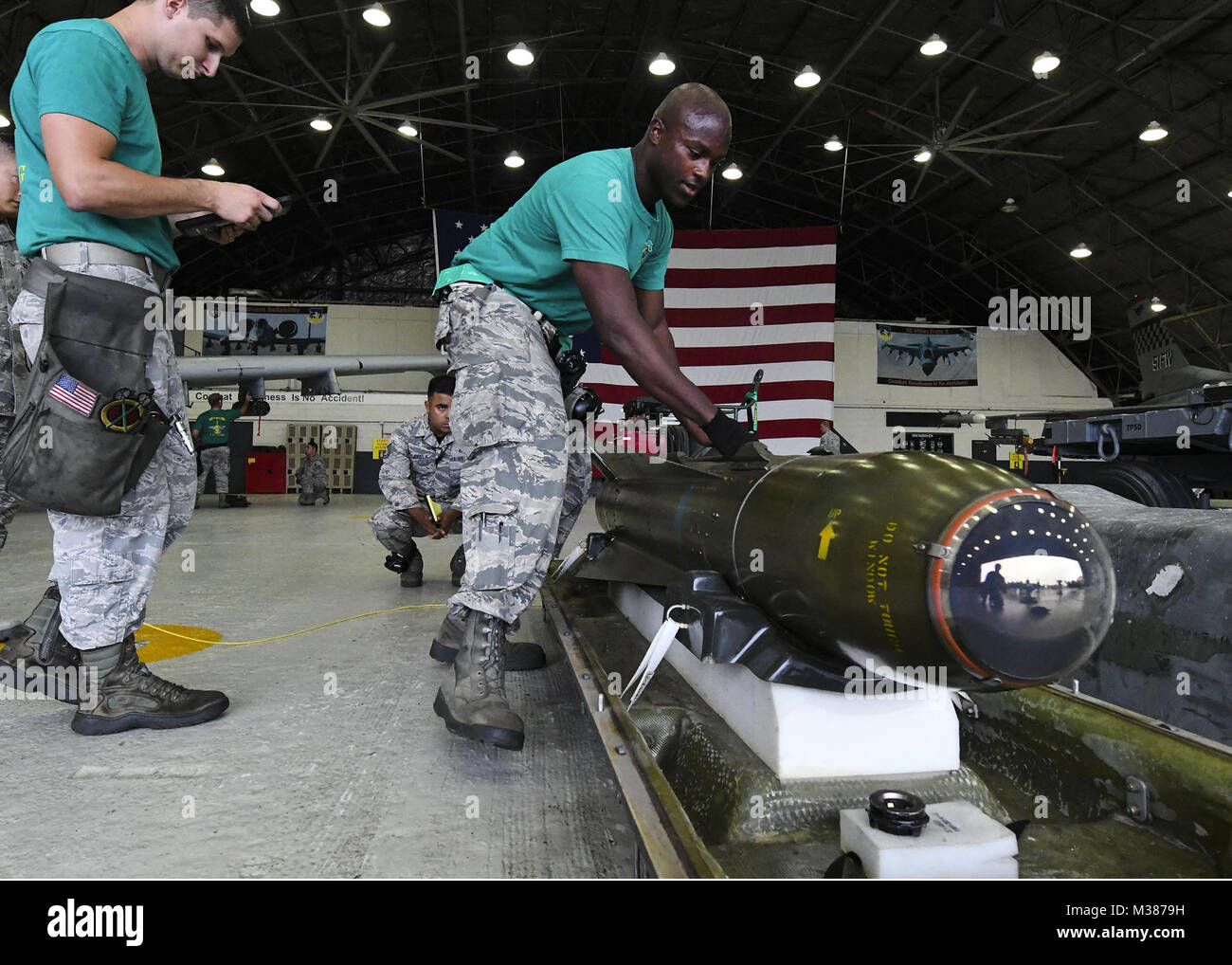 U.S. Airmen participate in quarterly weapons load competition in the ...