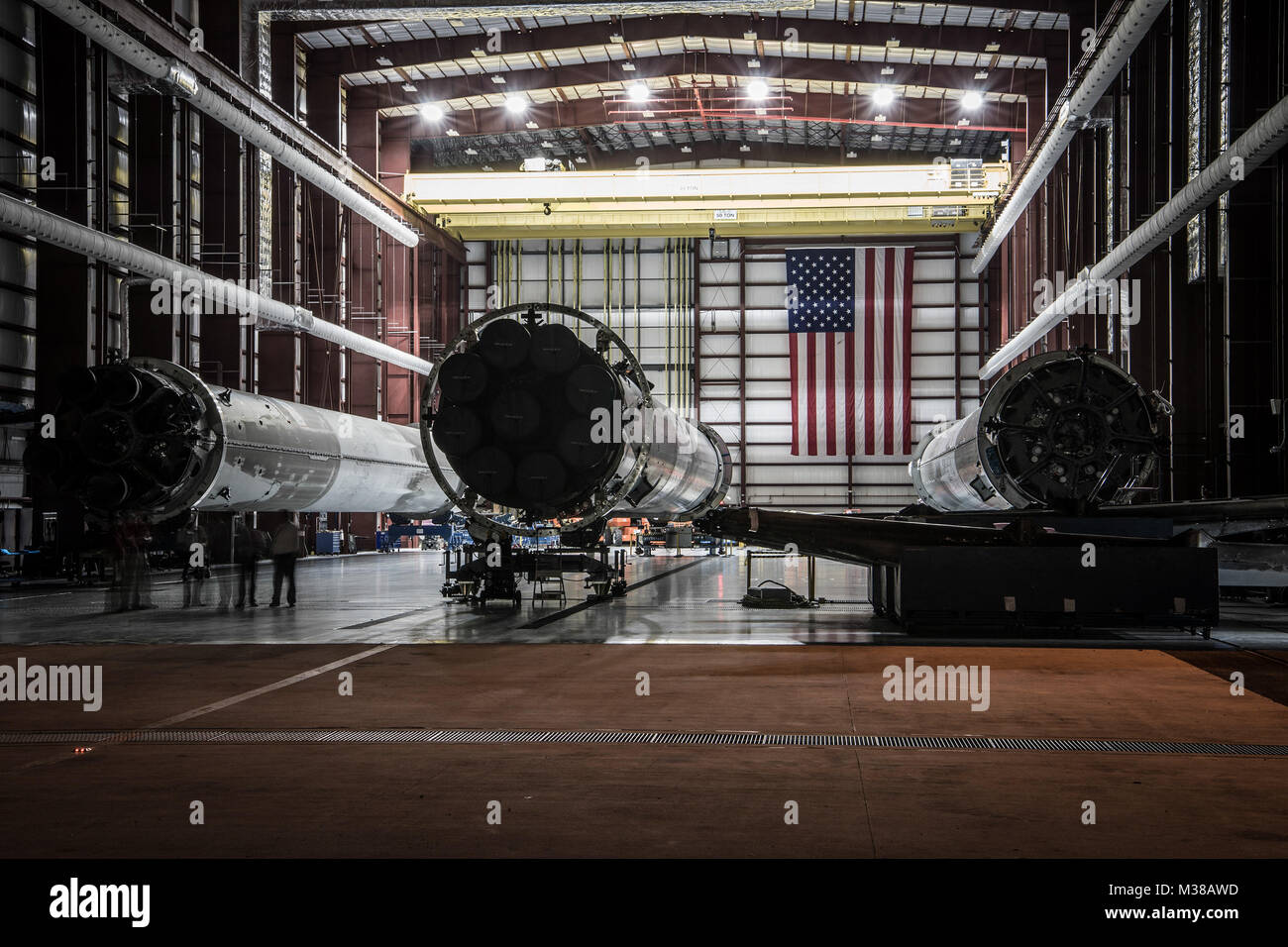 The first stage of SpaceX’s Falcon 9 rocket is pictured in Hangar 39A ...