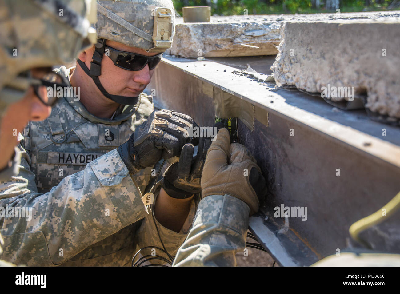 Staff Sgt. Thomas Hayden and Spc. Sean Farrell, combat engineers from ...