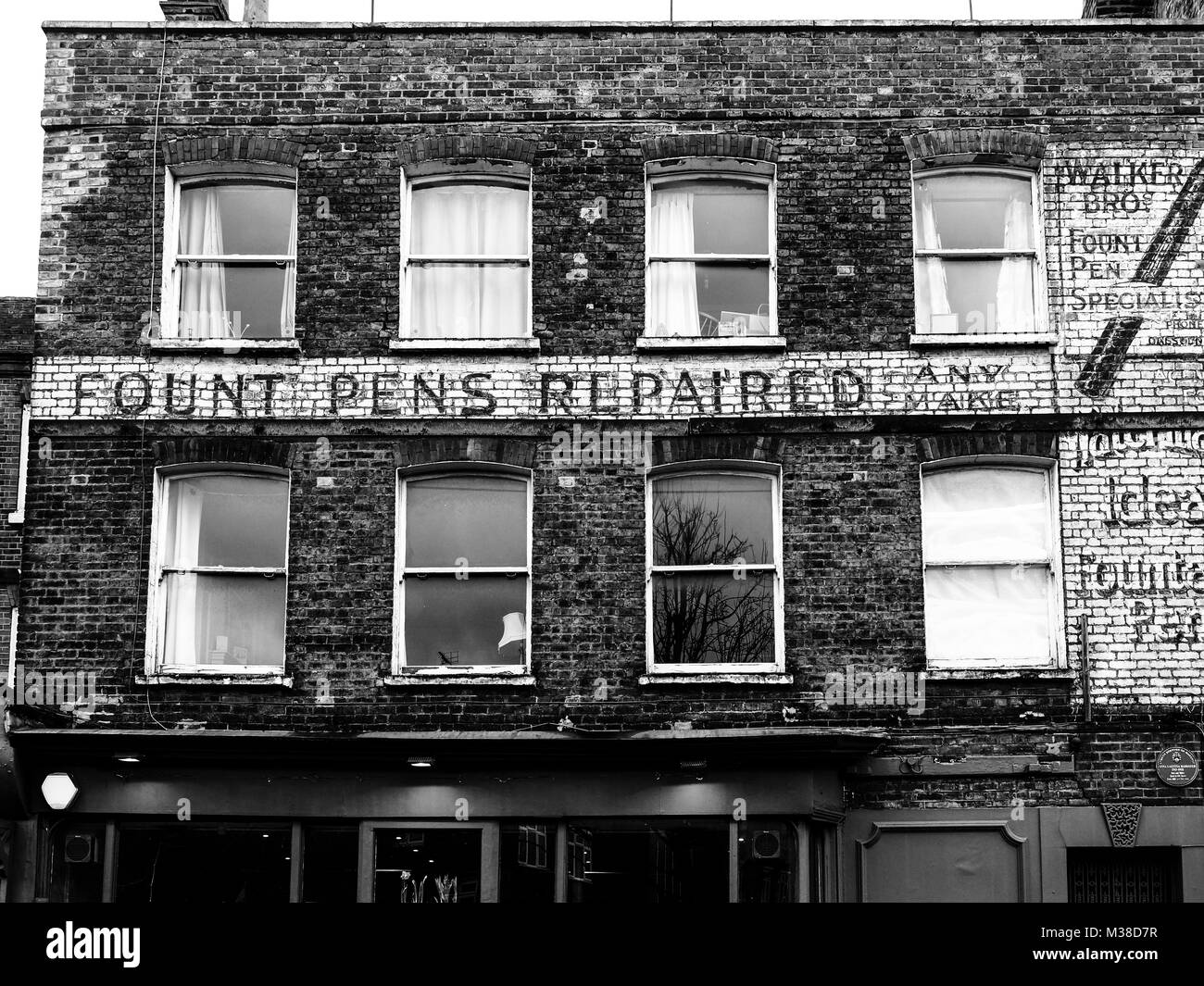London ghost sign Black and White Stock Photos & Images - Alamy