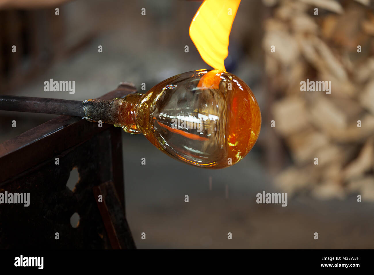glass blower carefully making his product Stock Photo - Alamy