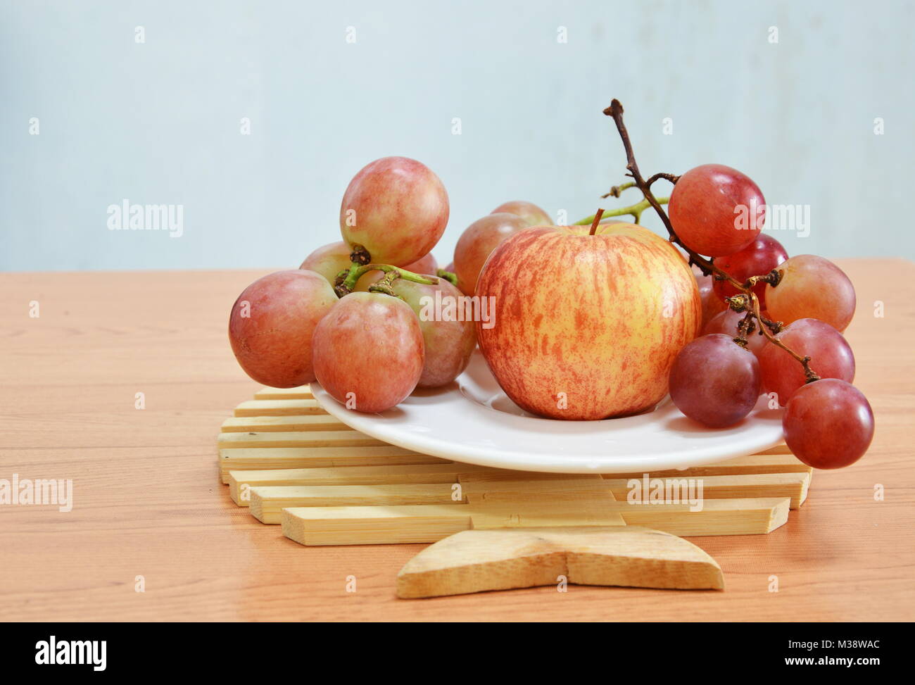 apple and red grape Stock Photo - Alamy