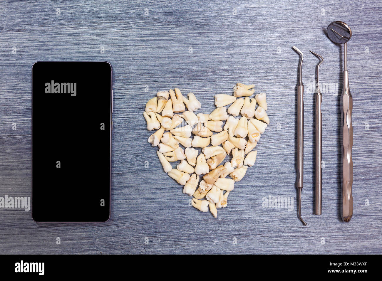 Instruments for dentists and teeth of people Stock Photo - Alamy