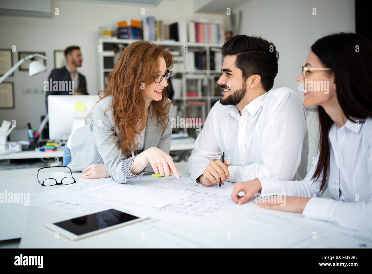 Group of architects working on project Stock Photo - Alamy